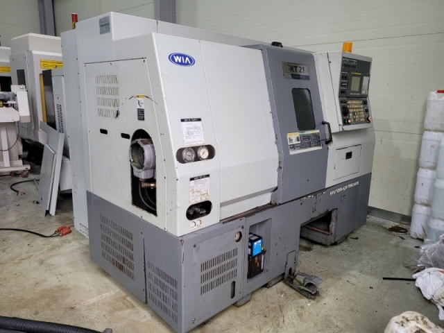 현대위아 8인치 CNC선반 SKT-21 중고CNC선반 FANUC 0i-TC, 4,000RPM, 큐센타, 심압대 터렛12각 ...